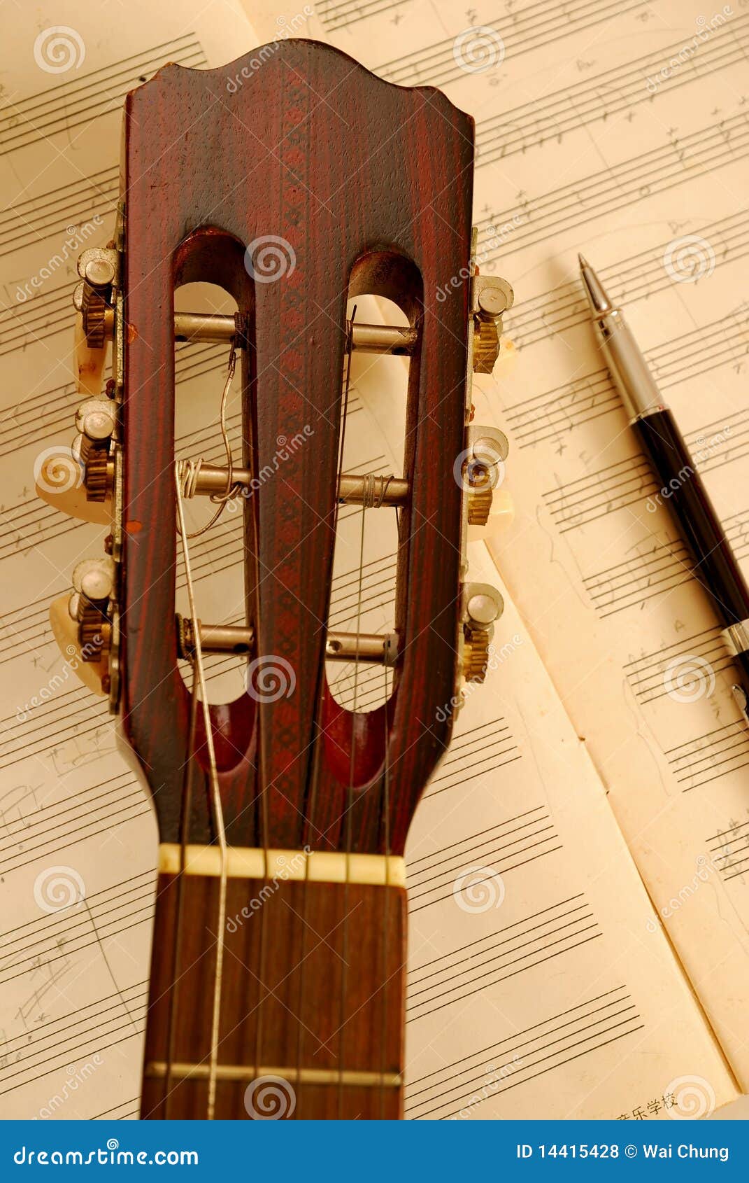 Guitar with Pen on Music Manuscript Stock Photo - Image of melody ...