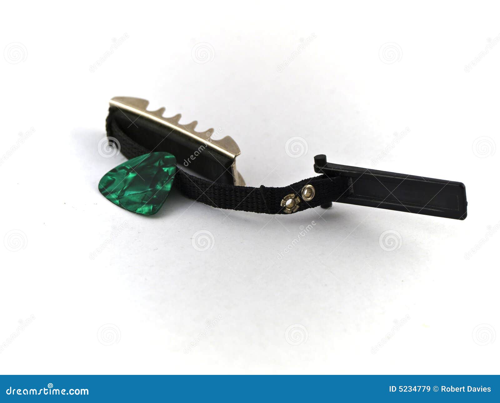 Guitar Plactrum and Capo on White Background Stock Image - Image of ...