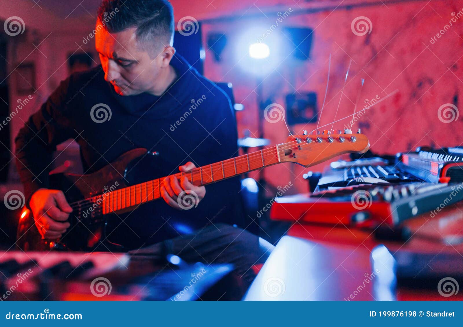 Guitar Player Have Recording Session Indoors in the Studio Stock Photo ...