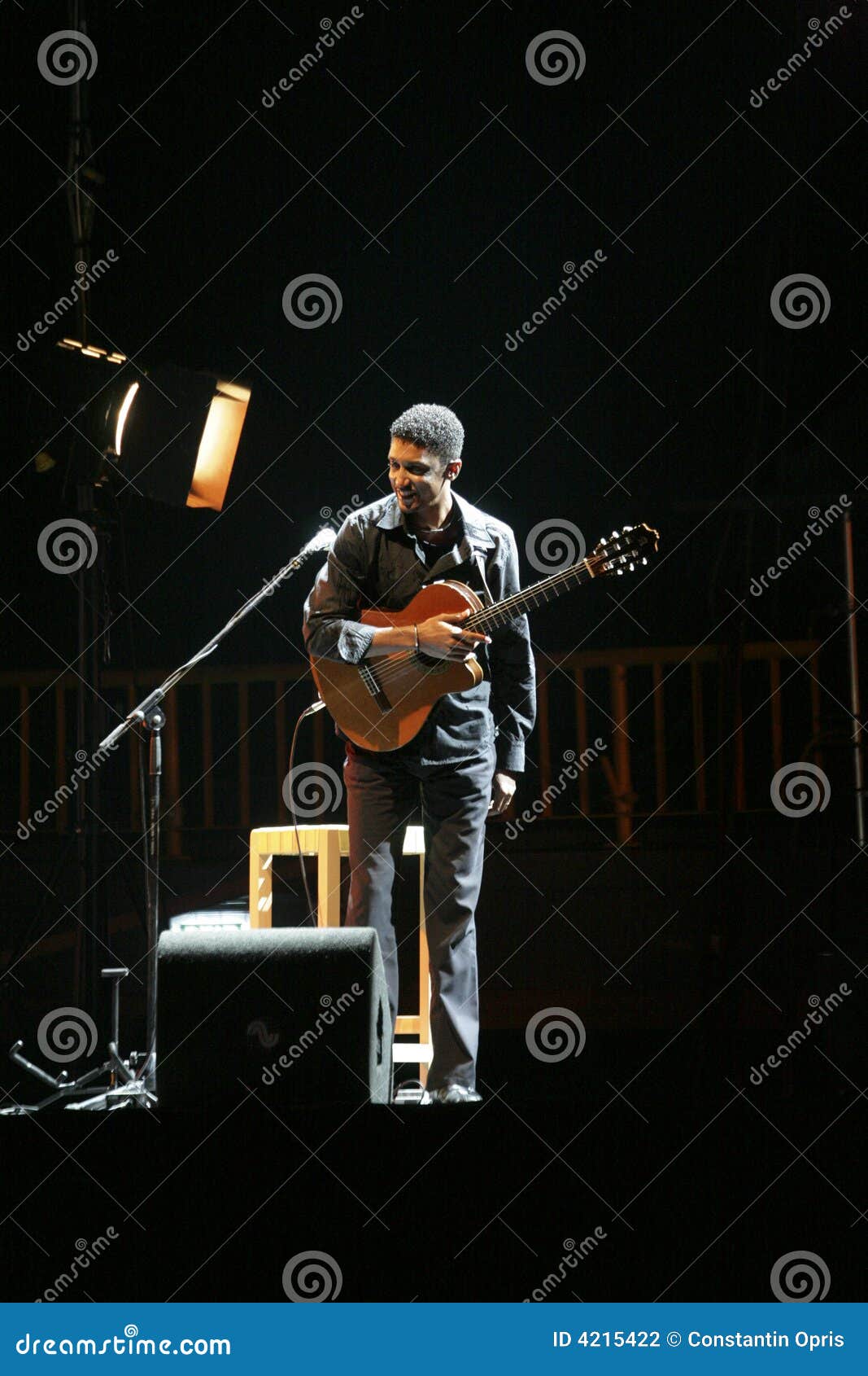 Guitar player on stage editorial photography. Image of guitar - 4215422