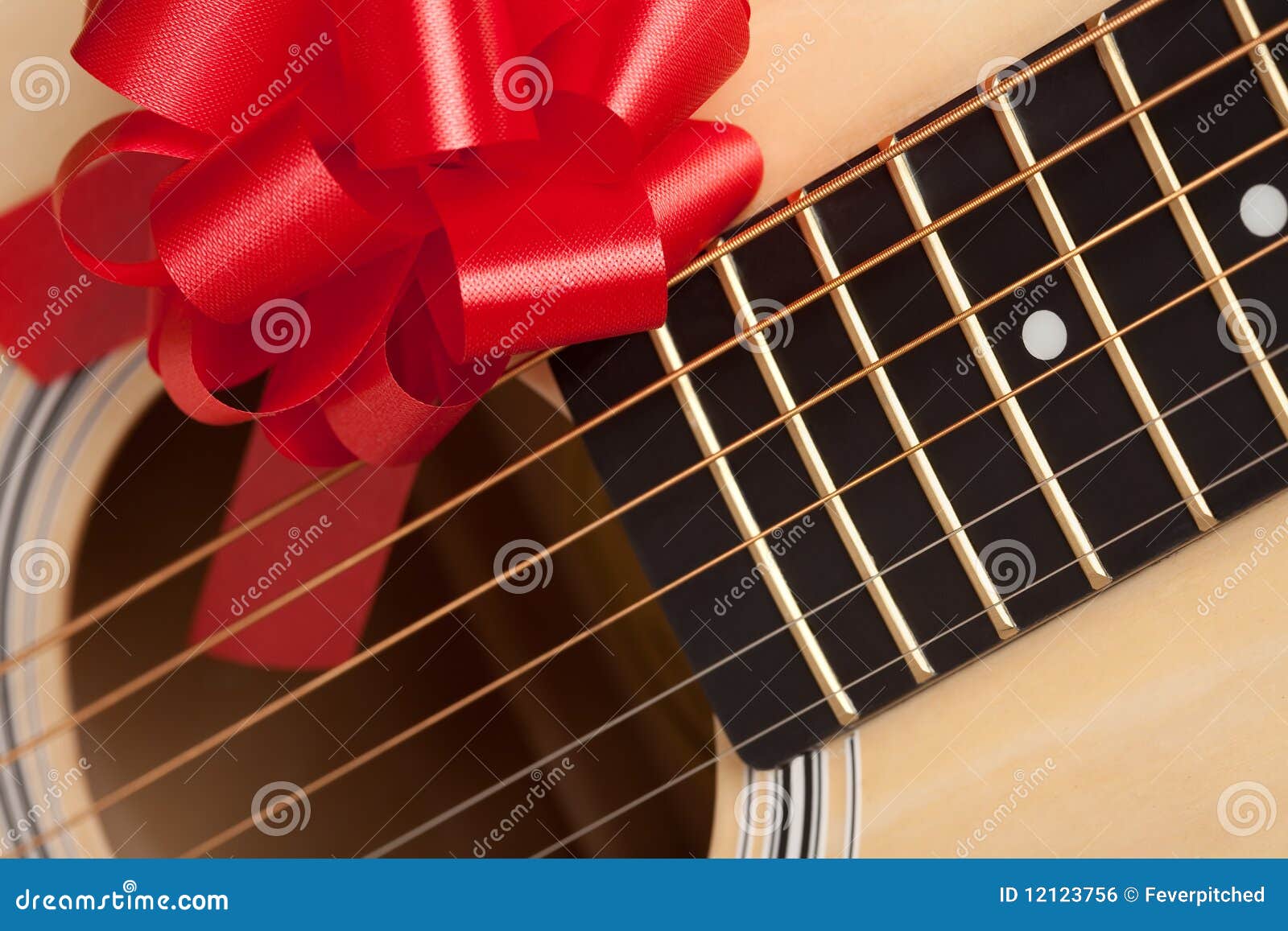 Guitar Strings with Red Ribbon Stock Photo - Image of closeup, music ...