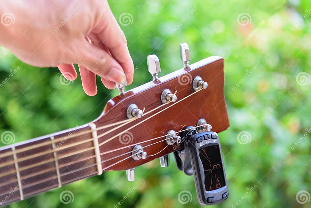 Tuning Guitar Strings Notes Stock Image - Image of musician, brown ...