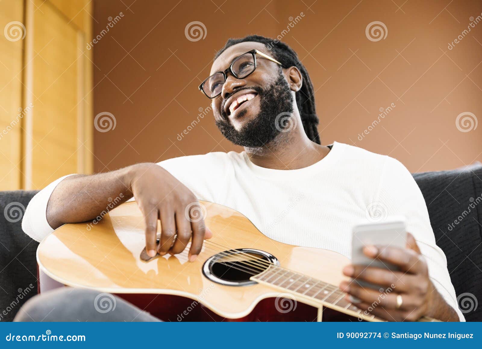 Guitarist with Guitar Using Mobile. Stock Photo - Image of audio, happy ...