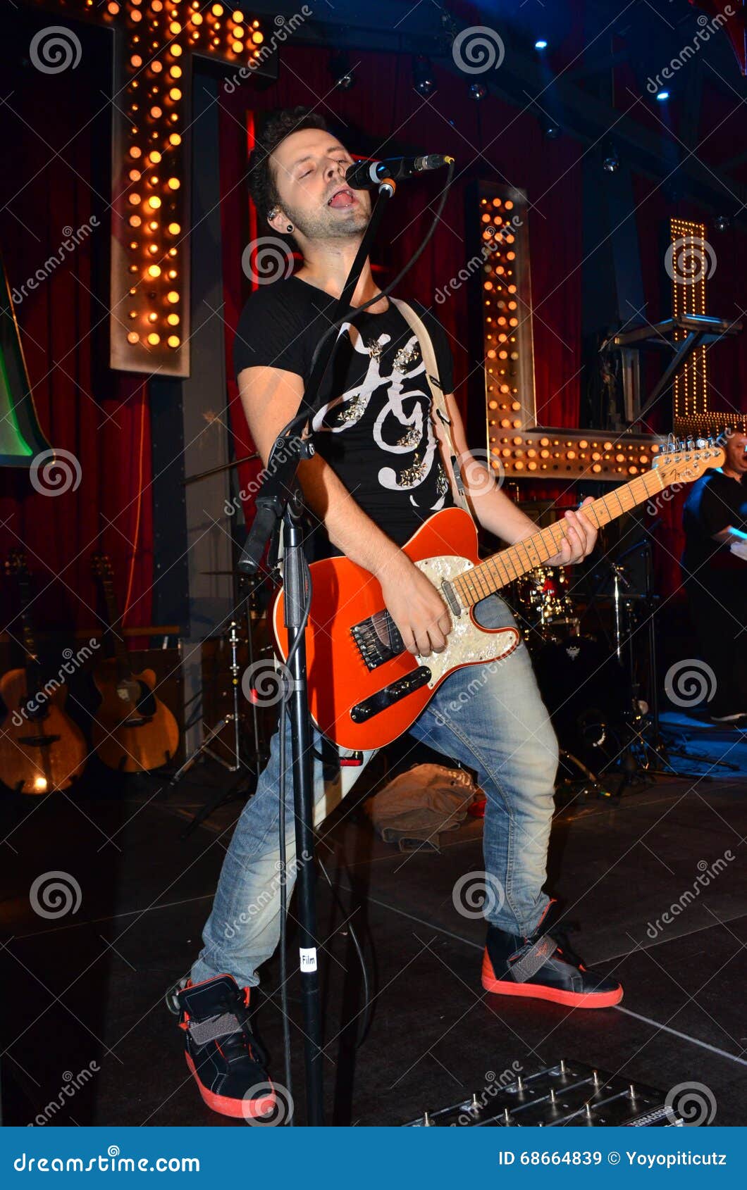 Guitarist player/singer editorial stock image. Image of background ...