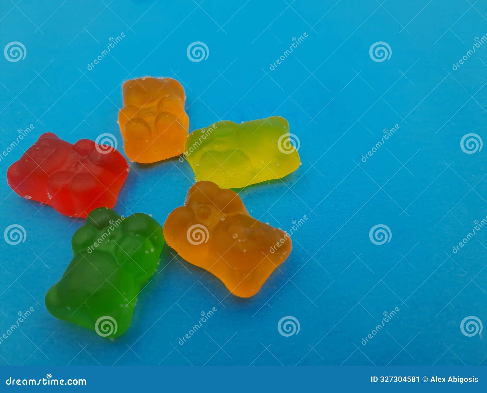 Gummie Bears Candy on a Blue Background Stock Image - Image of orange ...