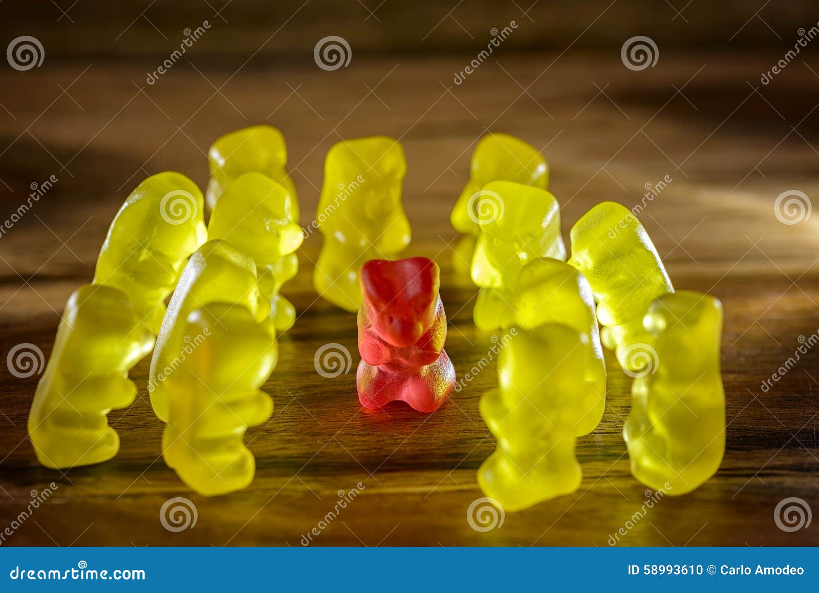 Unique Red Gummy Bear And Group Of Many Yellow Bears. Standing Out From ...