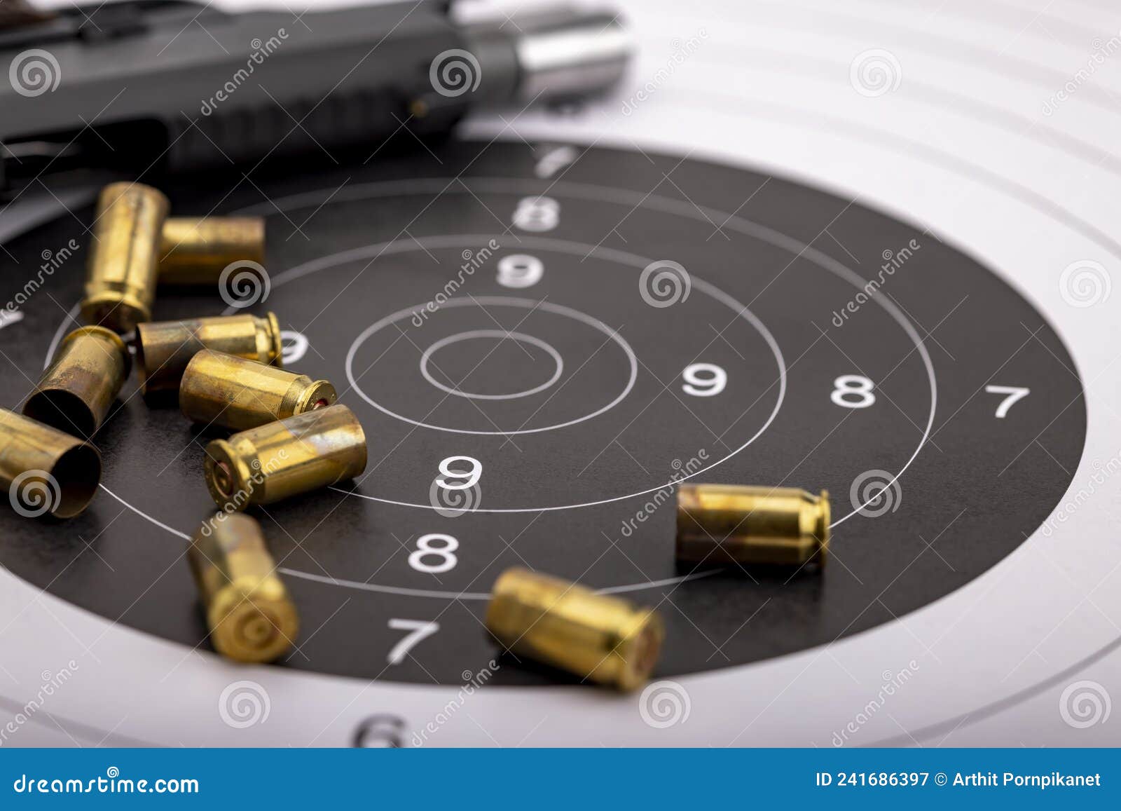 Gun and Bullets on Bull Eye Target for Shooting Practice Stock Image ...