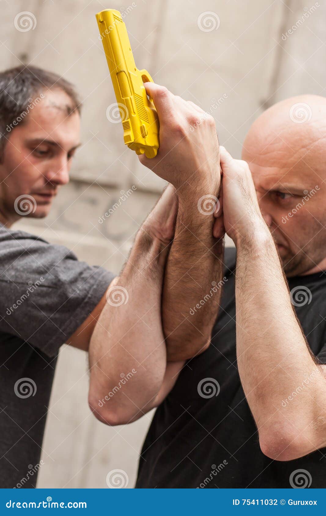 Gun Disarm. Self Defense Techniques Against a Gun Point. Stock Photo ...