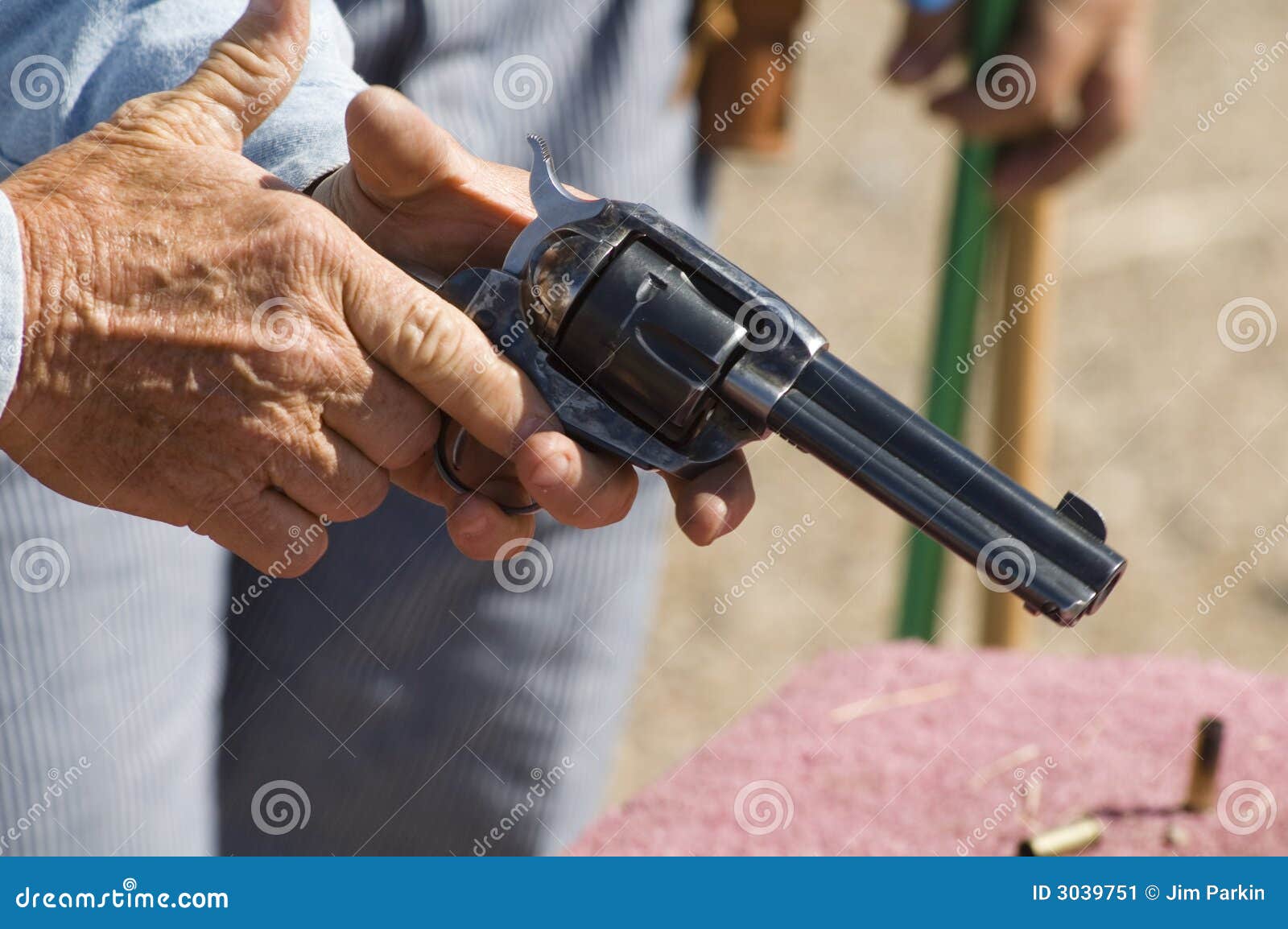 Gun in hand 4 stock image. Image of cowboy, brass, caliber - 3039751