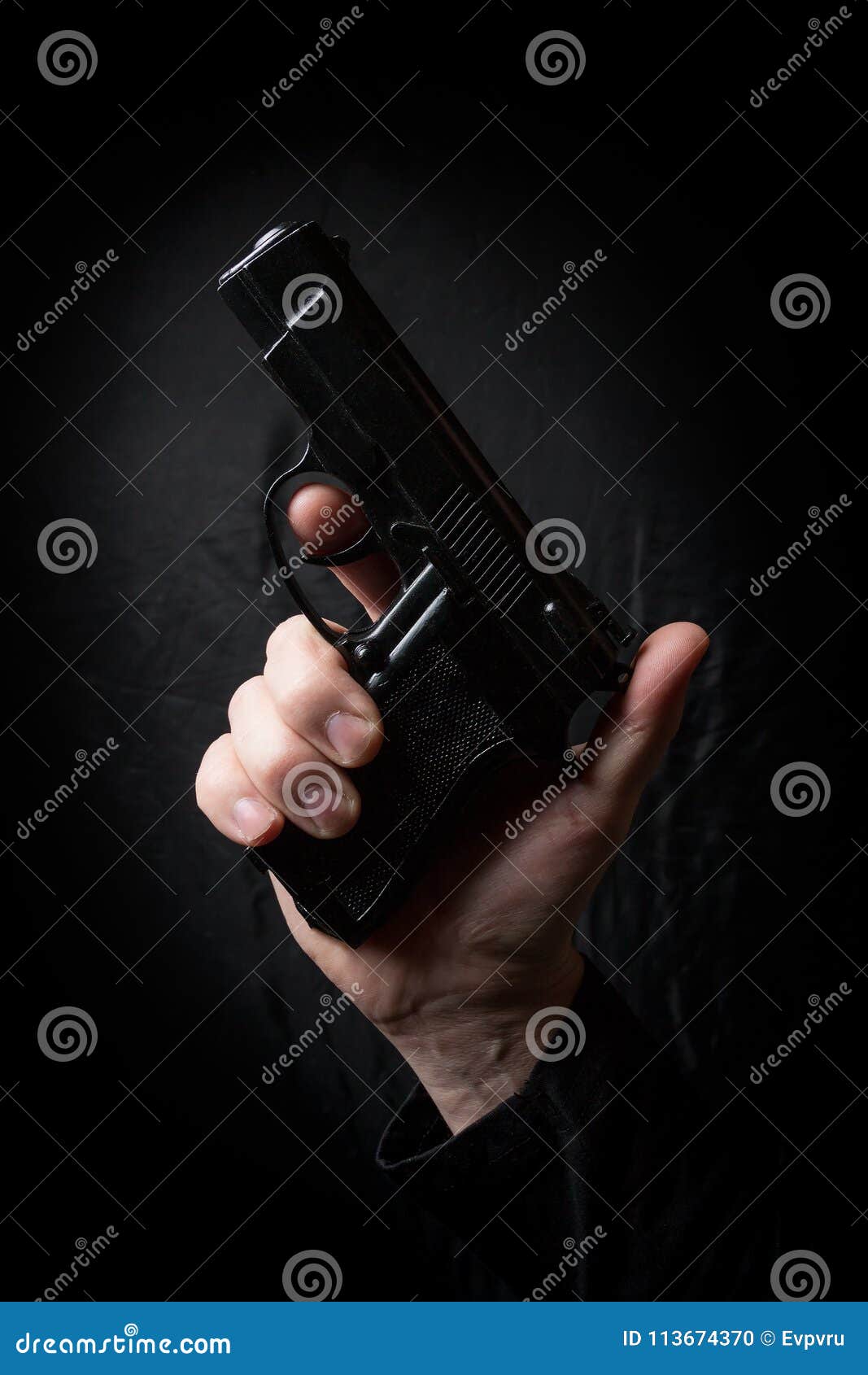 Gun in the hand of man stock photo. Image of male, caucasian - 113674370