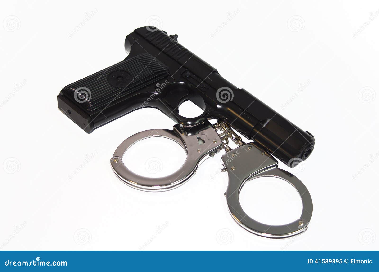 Gun and handcuffs stock image. Image of busted, lock - 41589895