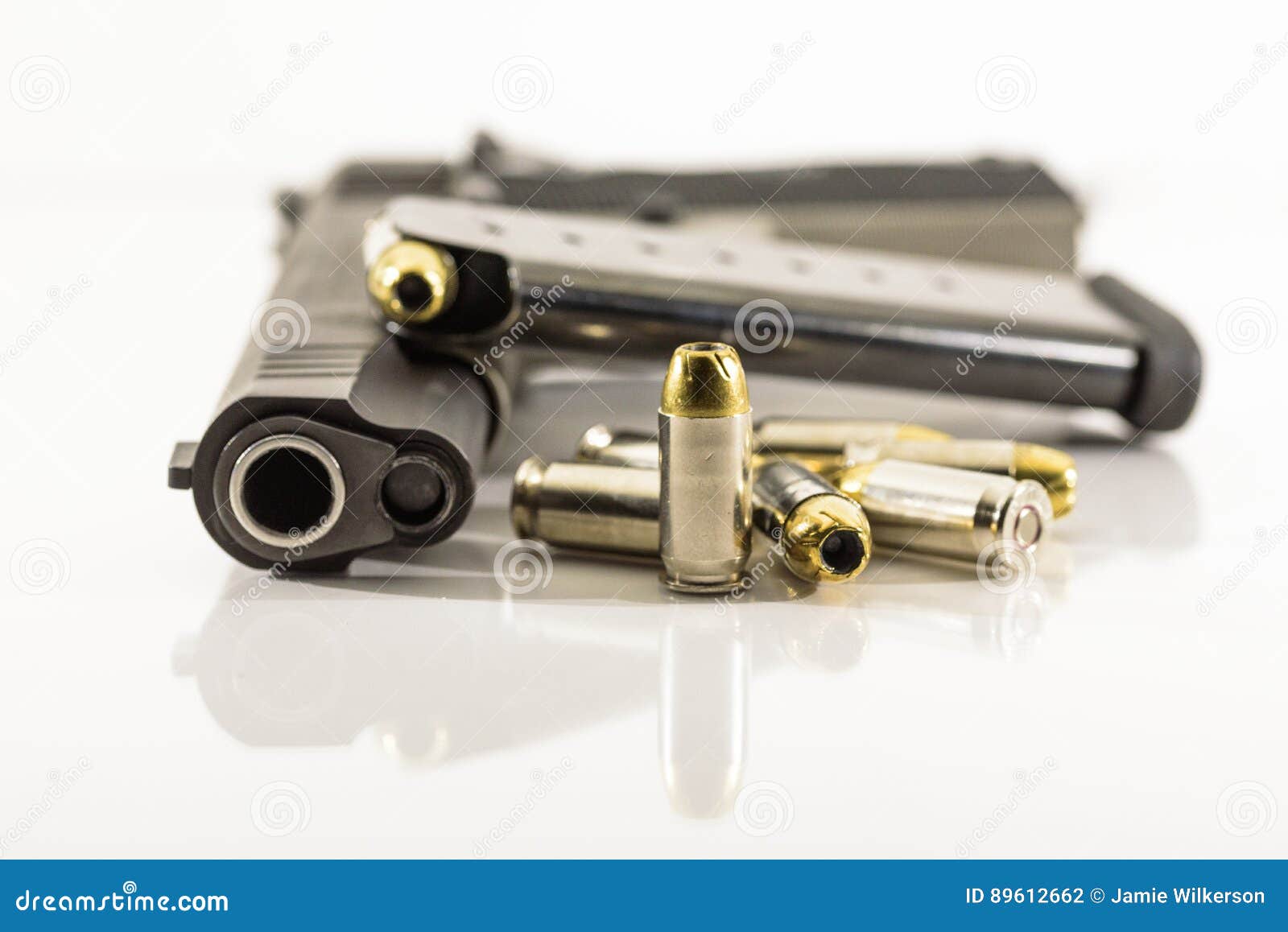 Gun stock photo. Image of point, handgun, brass, white - 89612662