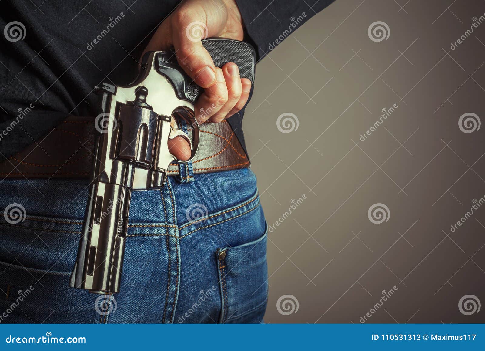 The gun in hands. stock image. Image of hidden, hands - 110531313