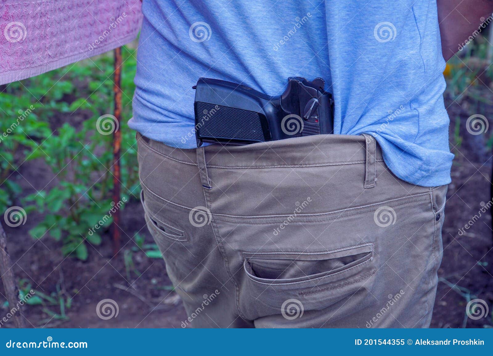 The Gun is Hidden Behind Man`s Back Stock Image - Image of handgun ...