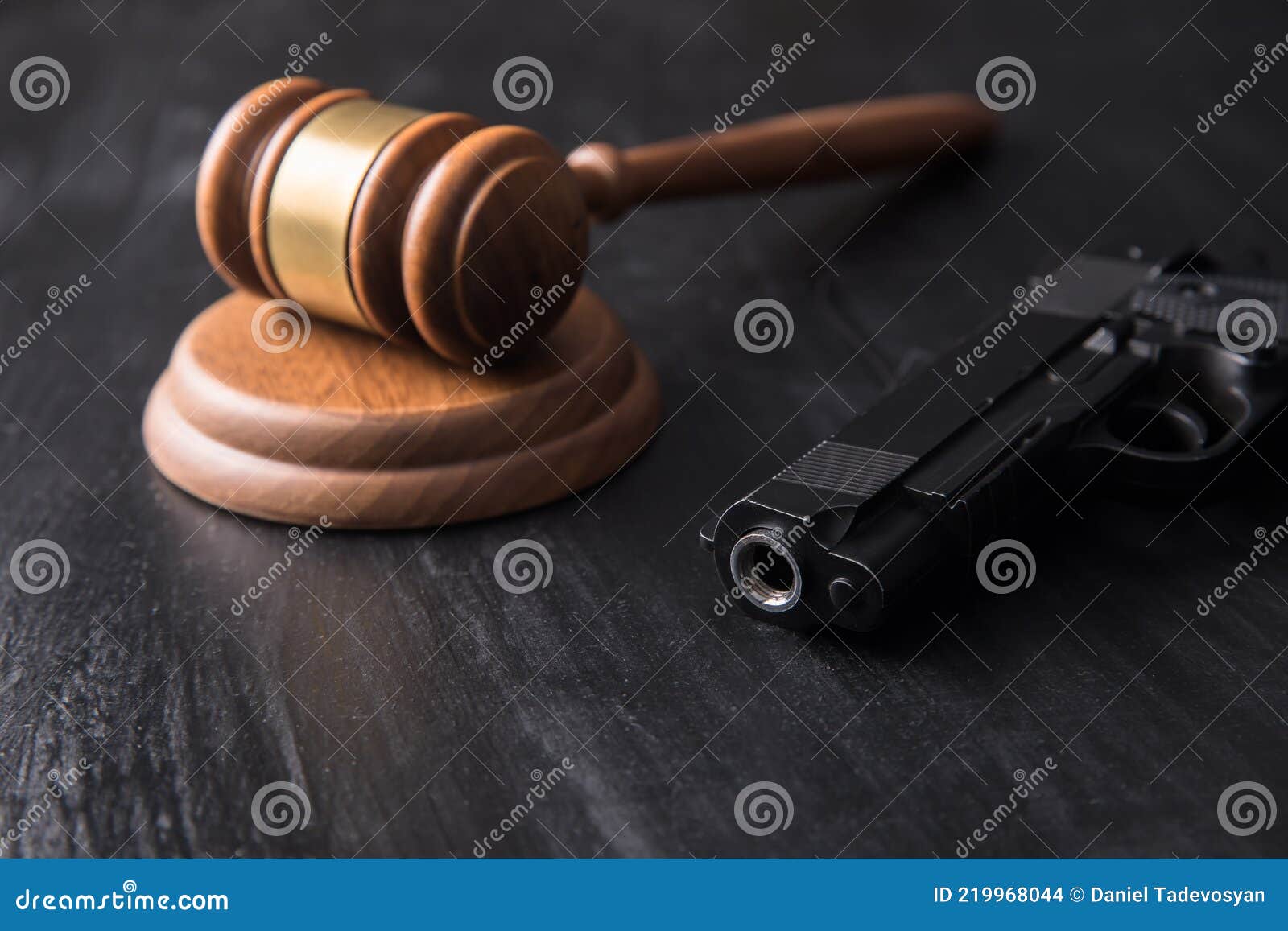 Gun and judge gavel stock photo. Image of justice, gavel - 219968044