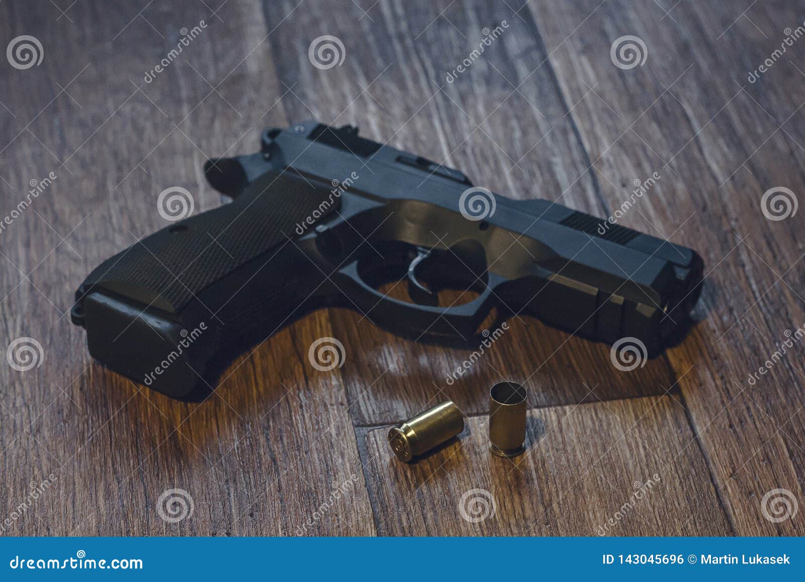 Gun Lying on the Ground with Shells Stock Photo - Image of crime ...