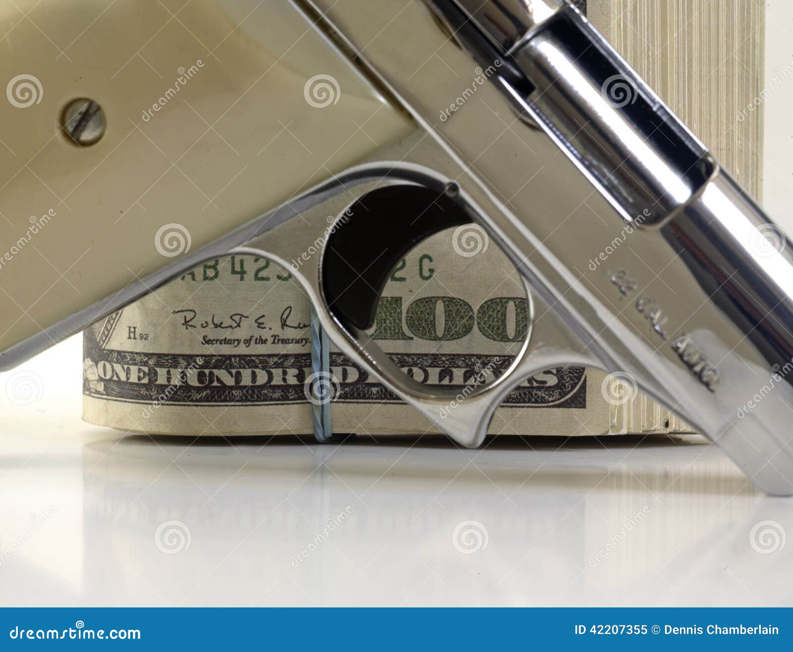 Gun and Money stock image. Image of bills, pistol, cash - 42207355