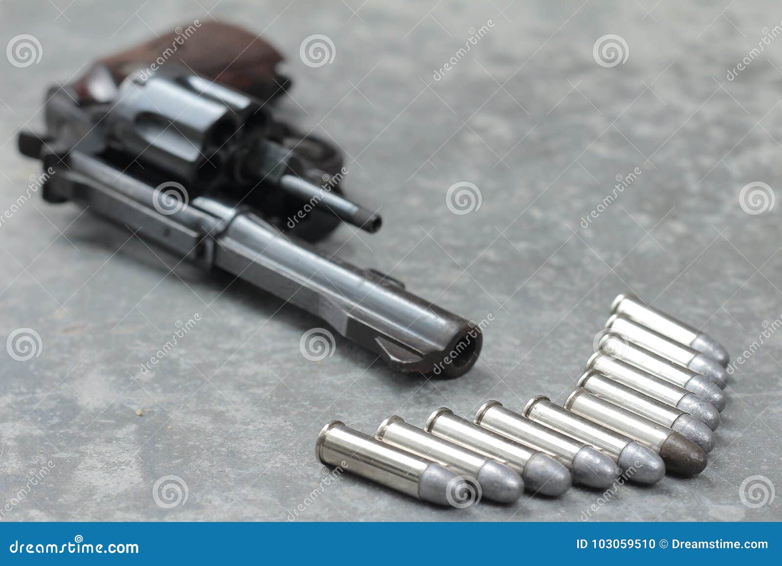 Gun revolver and bullet stock photo. Image of background - 103059510