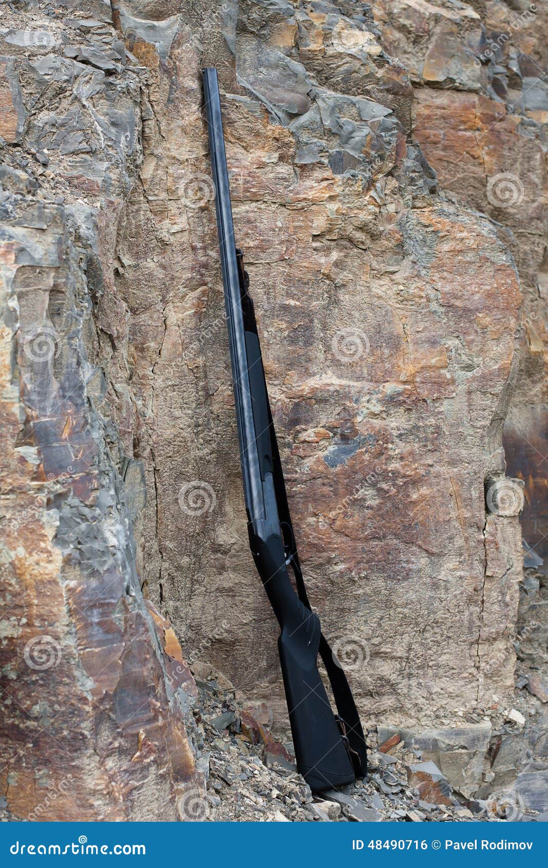 Gun at the rock stock photo. Image of vertical, equipment - 48490716