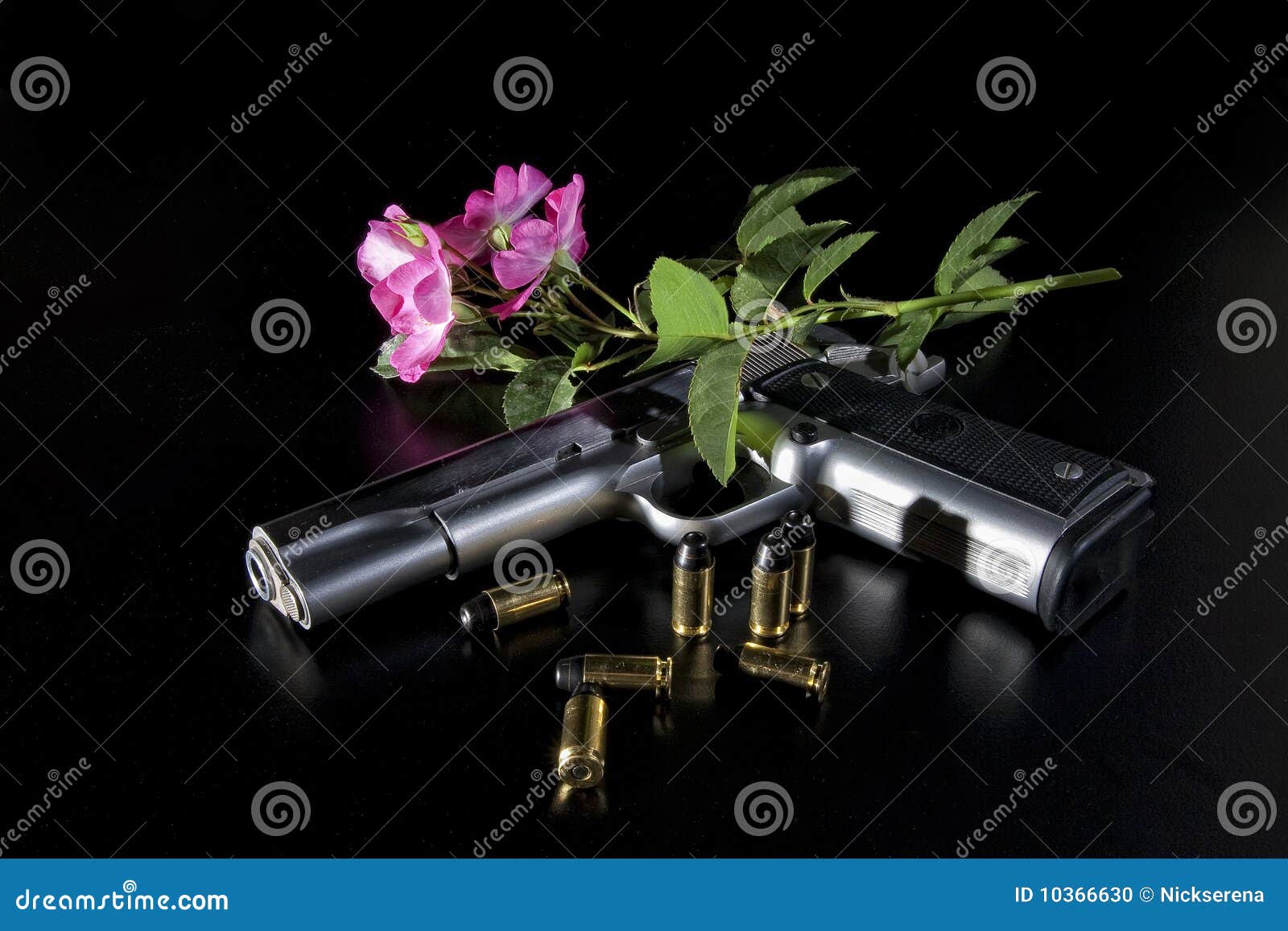 The gun & roses stock photo. Image of pistol, automatic - 10366630
