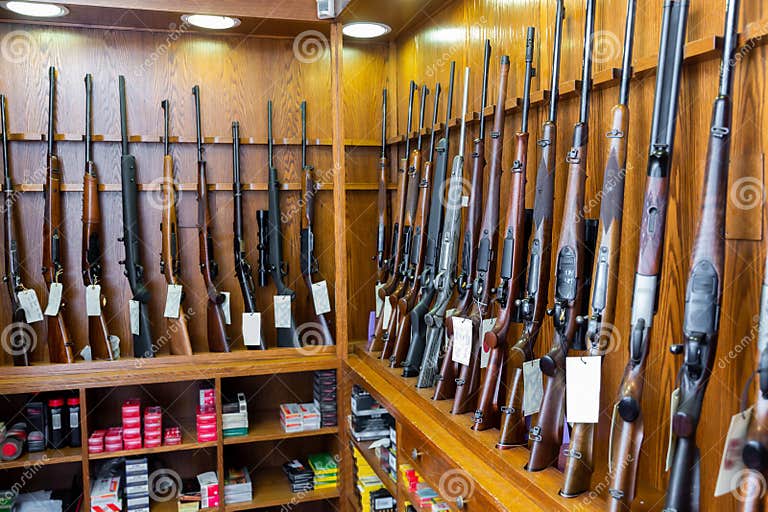 Gun Store Interior with Rifles on Showcase Stock Photo - Image of store ...