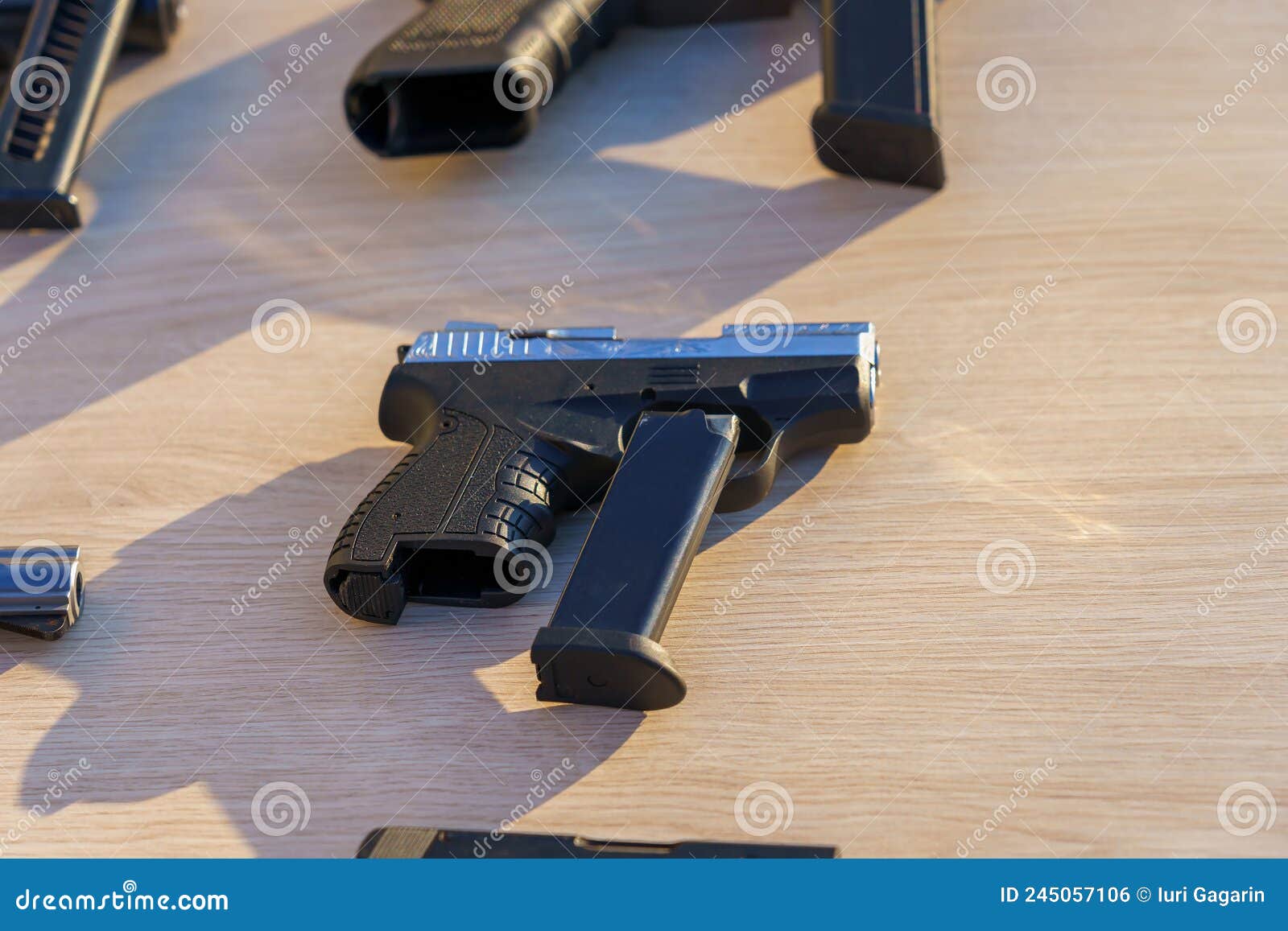 A Gun on the Table among the Weapons, Selective Focus. Crime News ...