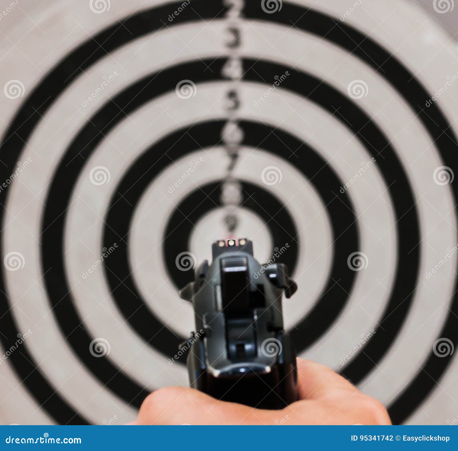 Gun on target stock photo. Image of square, weapon, shooter - 95341742