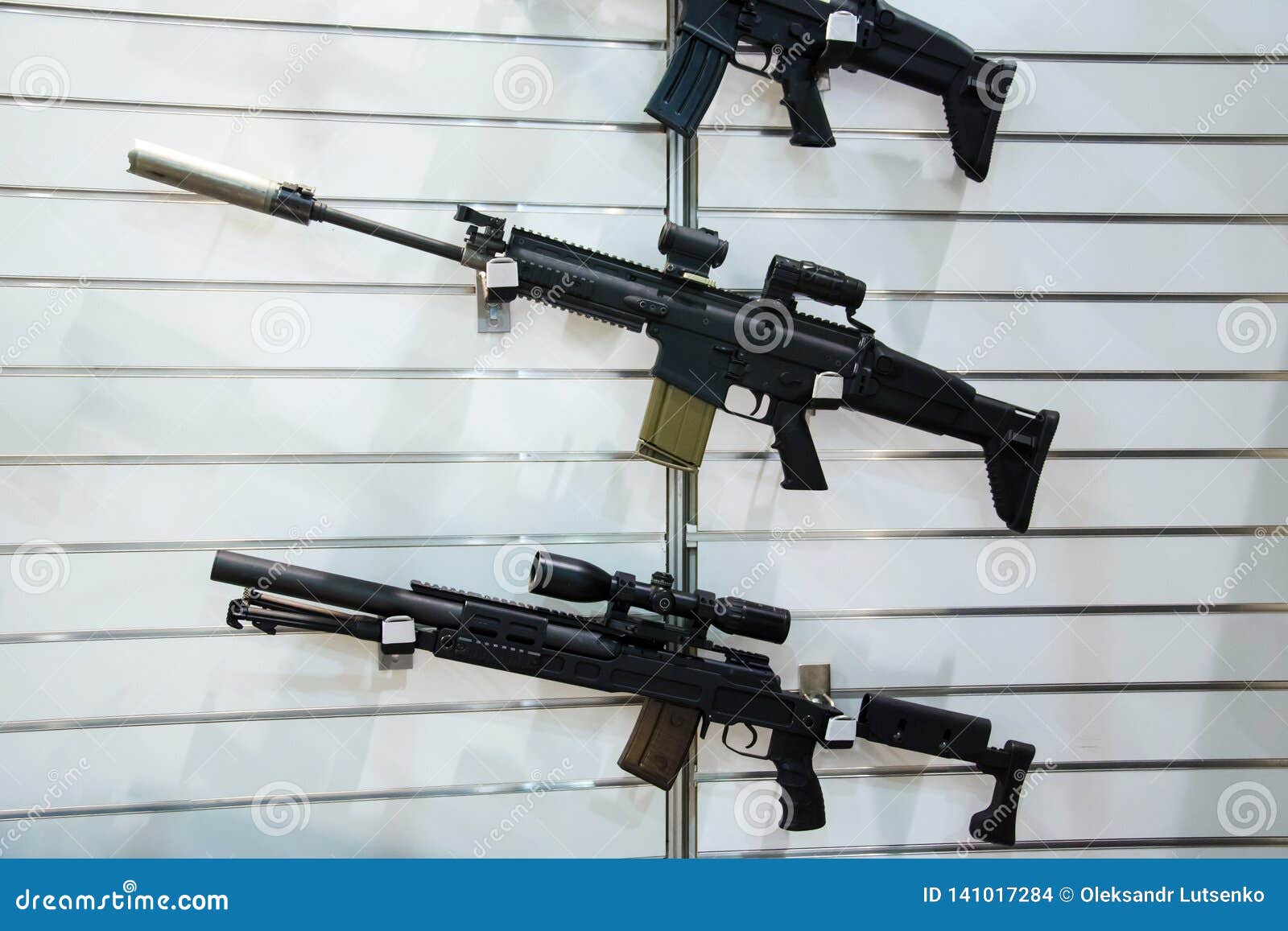 Gun wall rack with rifles stock photo. Image of sight - 141017284