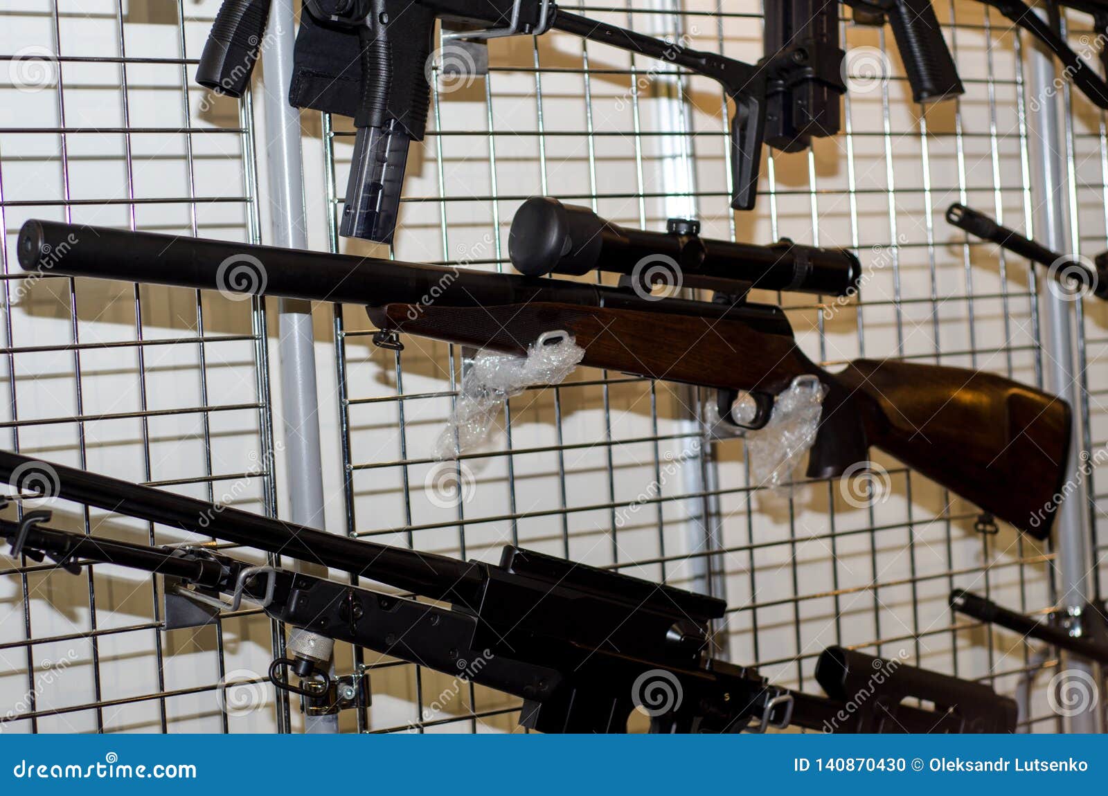 Gun wall rack with rifles stock photo. Image of sight - 140870430