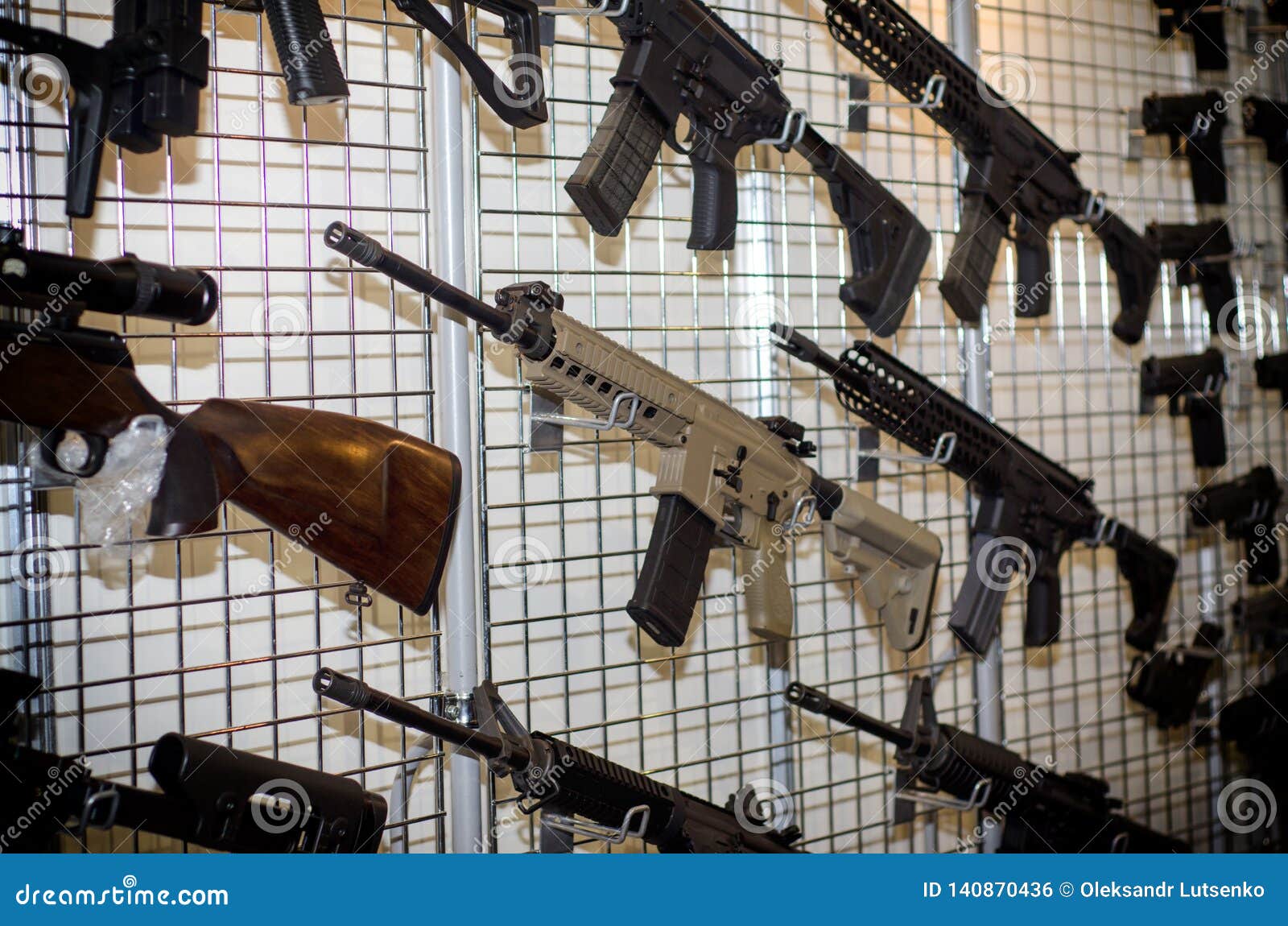 Gun wall rack with rifles stock photo. Image of firearm - 140870436