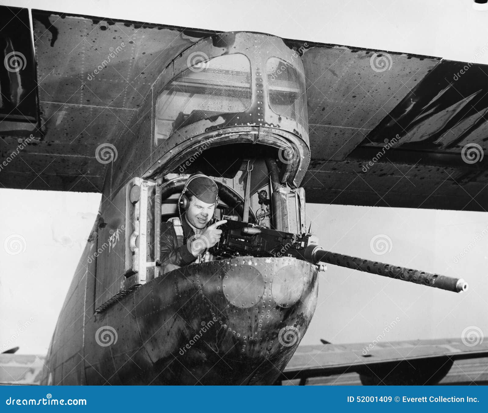 Gunner firing from plane stock image. Image of bygone - 52001409