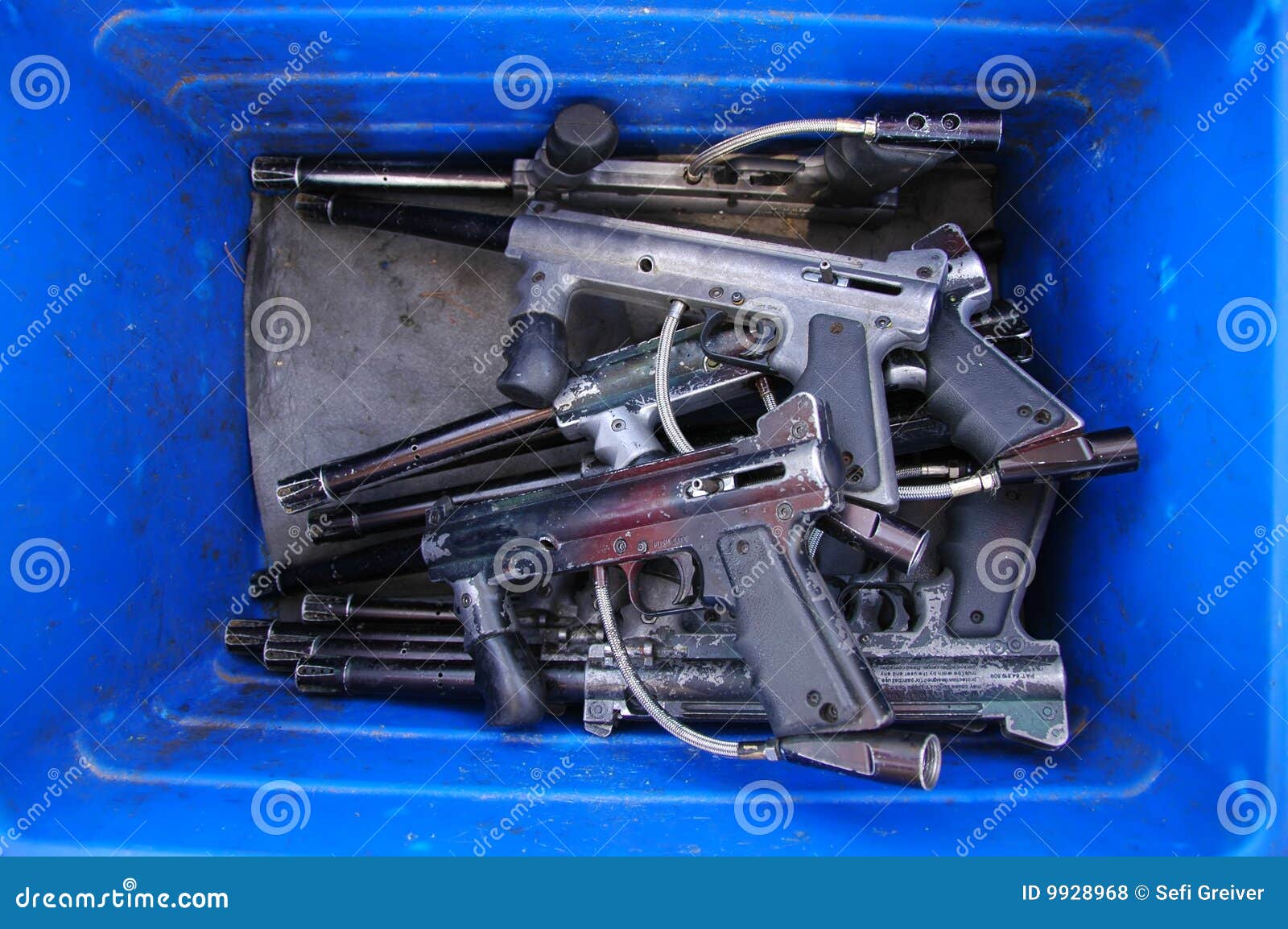 Guns in Blue Box stock photo. Image of ammunition, paint - 9928968