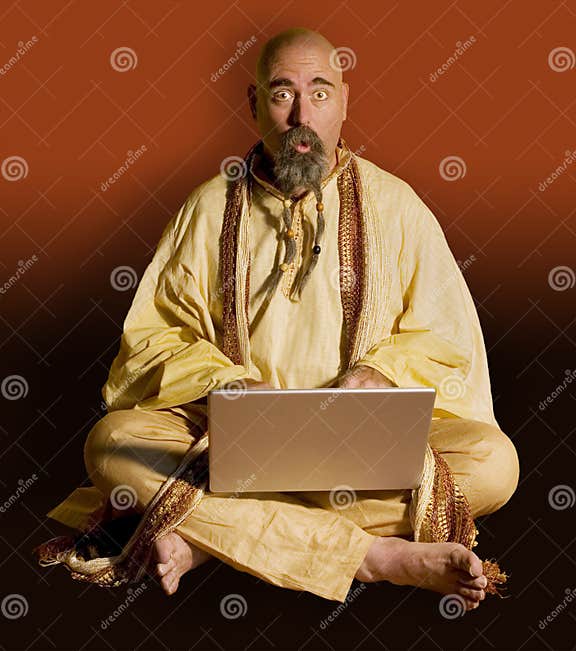 Guru wih a Laptop Computer stock image. Image of leader - 3004695