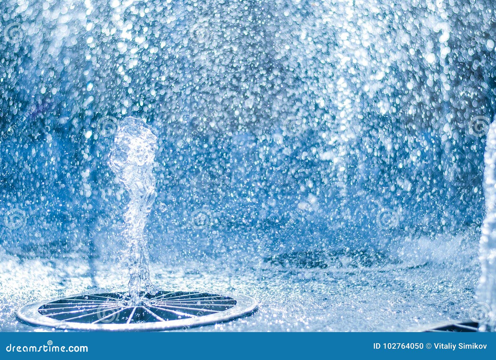 The Gush of Water of a Fountain. Splash of Water in the Fountain ...