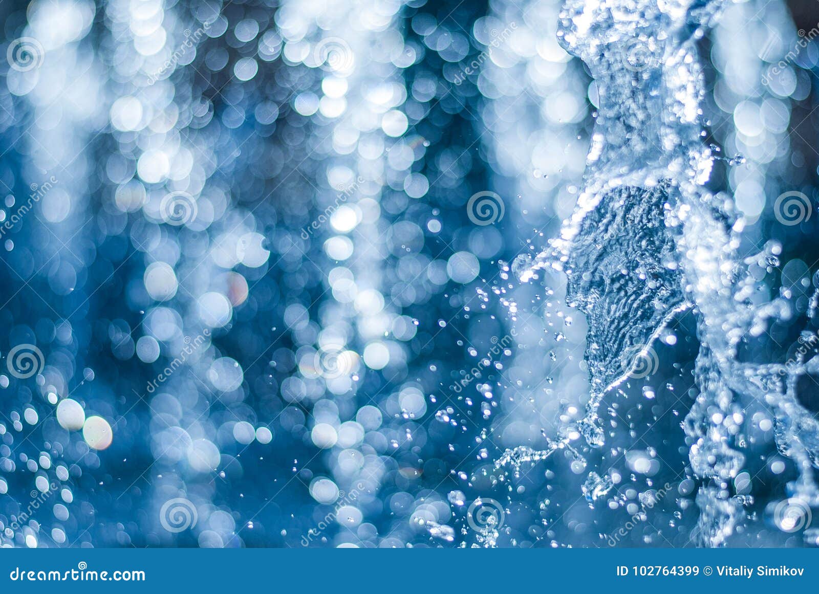 The Gush of Water of a Fountain. Splash of Water in the Fountain ...