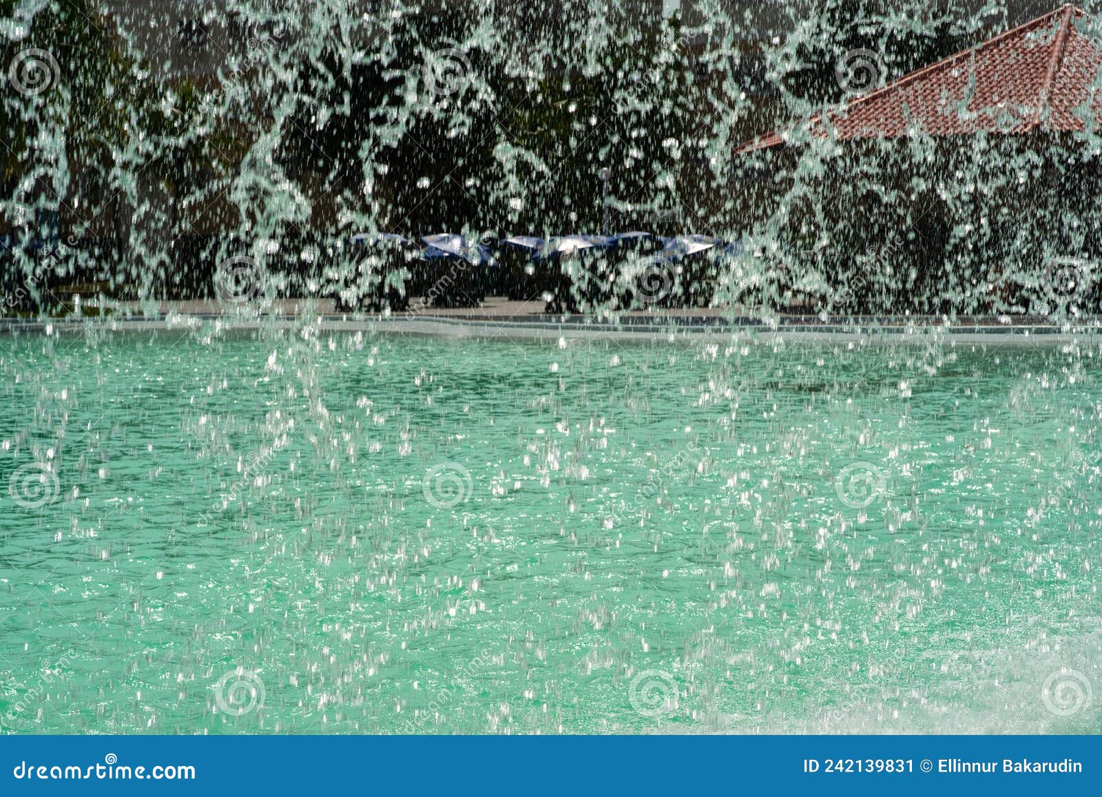 The Gush of Water of a Fountain. Splash of Water in the Fountain in ...