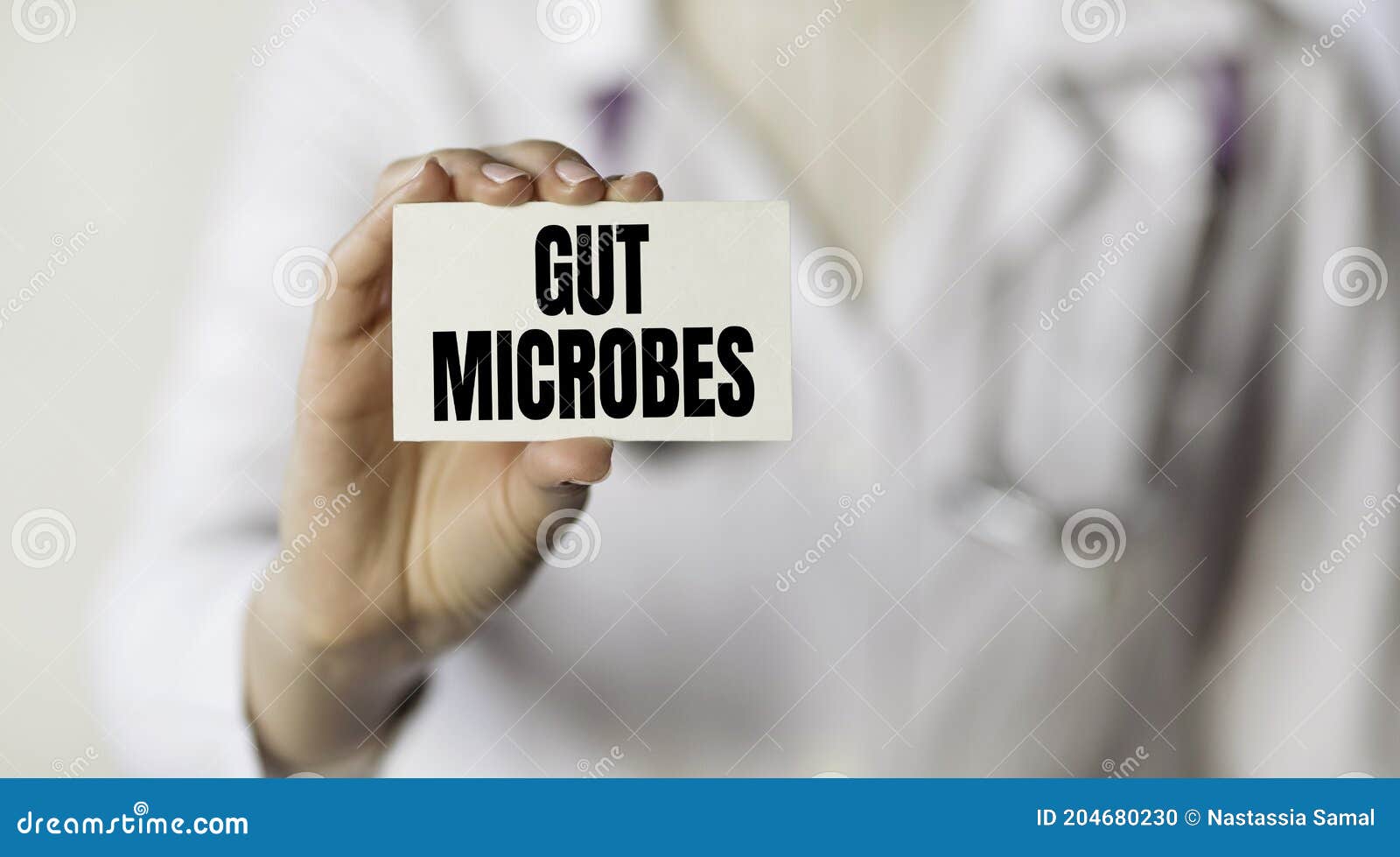 GUT MICROBES. Card with Text in Hand of Medical Doctor Stock Photo ...