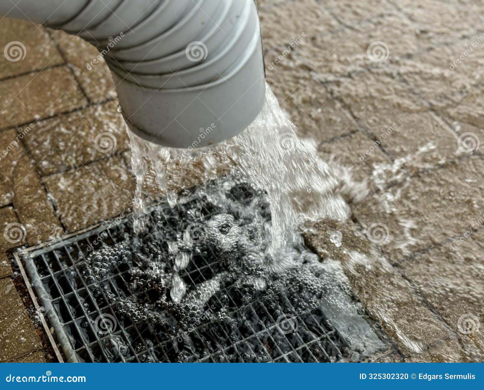 Gutter or Drain Pipe by the Wall of the Building, Rapid Flow of Water ...