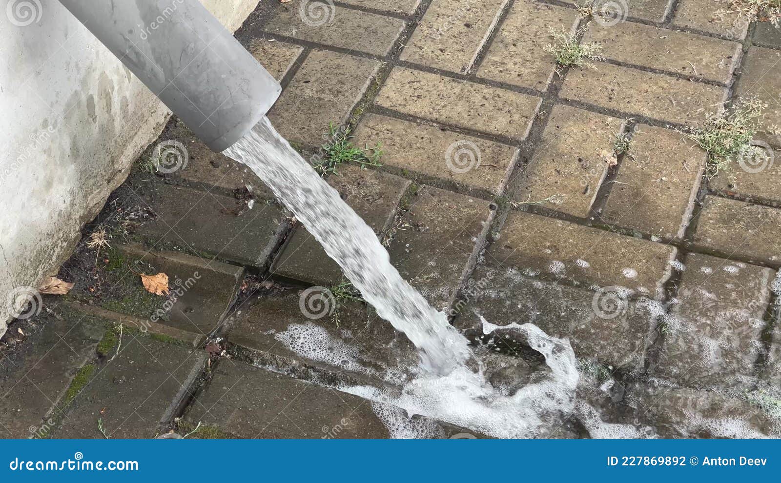 Gutter Pipe Line after Rain with Water Drainage. Drain Pipe. Stock ...