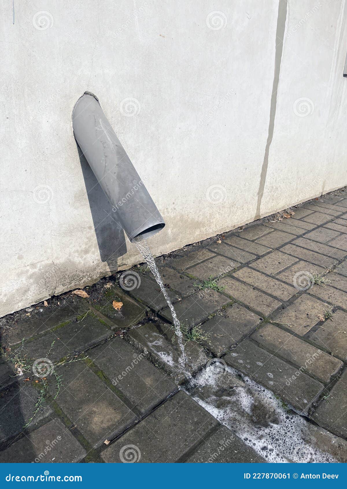 Drainage Drain With Metal Rusty Sewer Grate. Dirty Snow Around Drainage ...