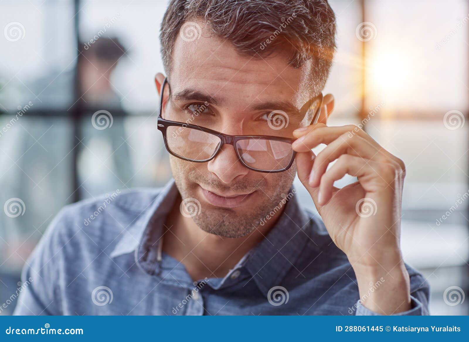 Handsome Young Guy Adjusting His Glasses in His Office Stock Image ...