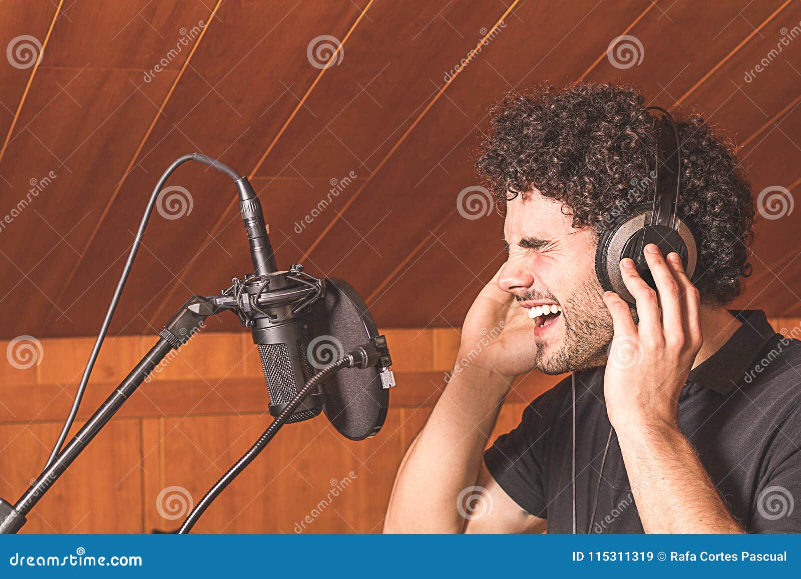 Guy Singing and Feeling the Music. Guy with Afro-hair Stock Image ...
