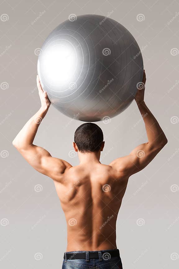Guy with ball stock photo. Image of healthy, muscular - 12835930