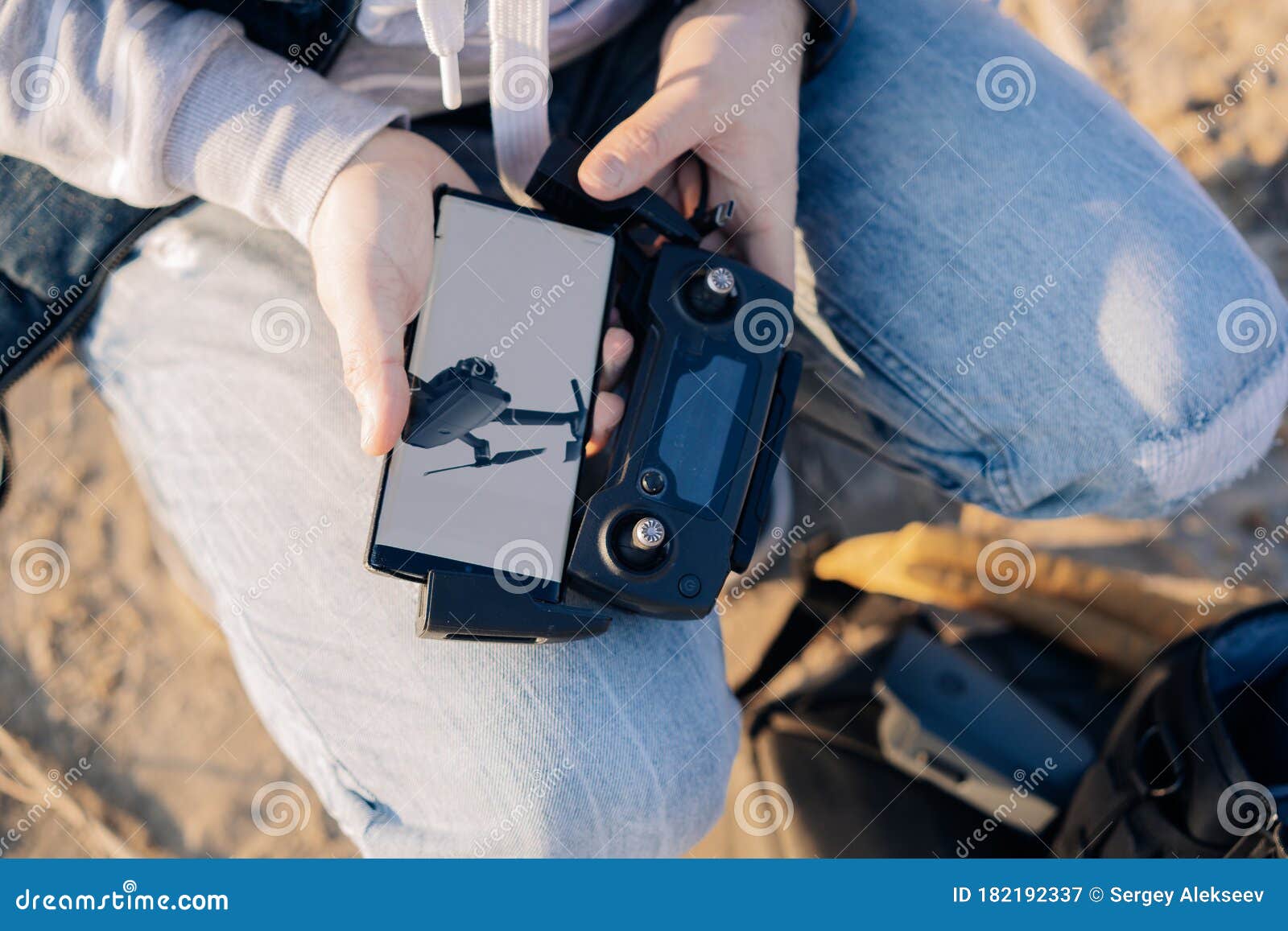 Guy Connects Smartphone To the Remote Control Quadcopter Stock Image ...
