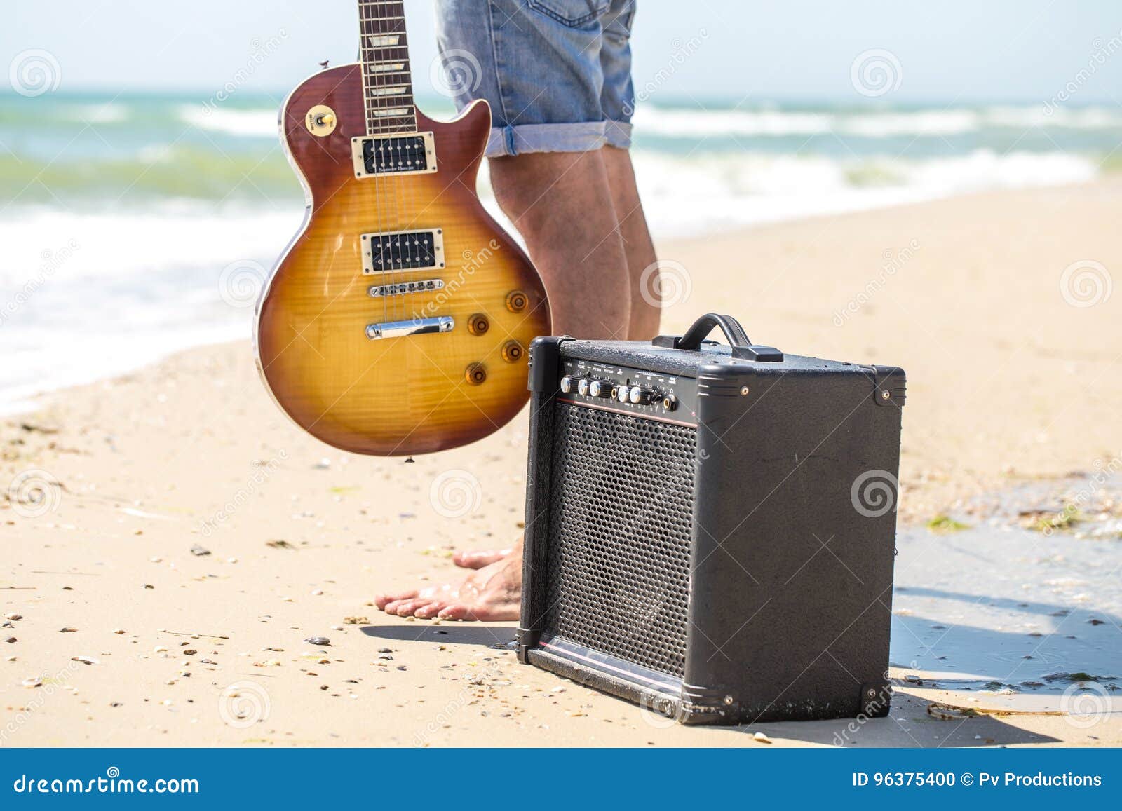 The Guy on the Beach with Musical Instruments Stock Photo - Image of ...