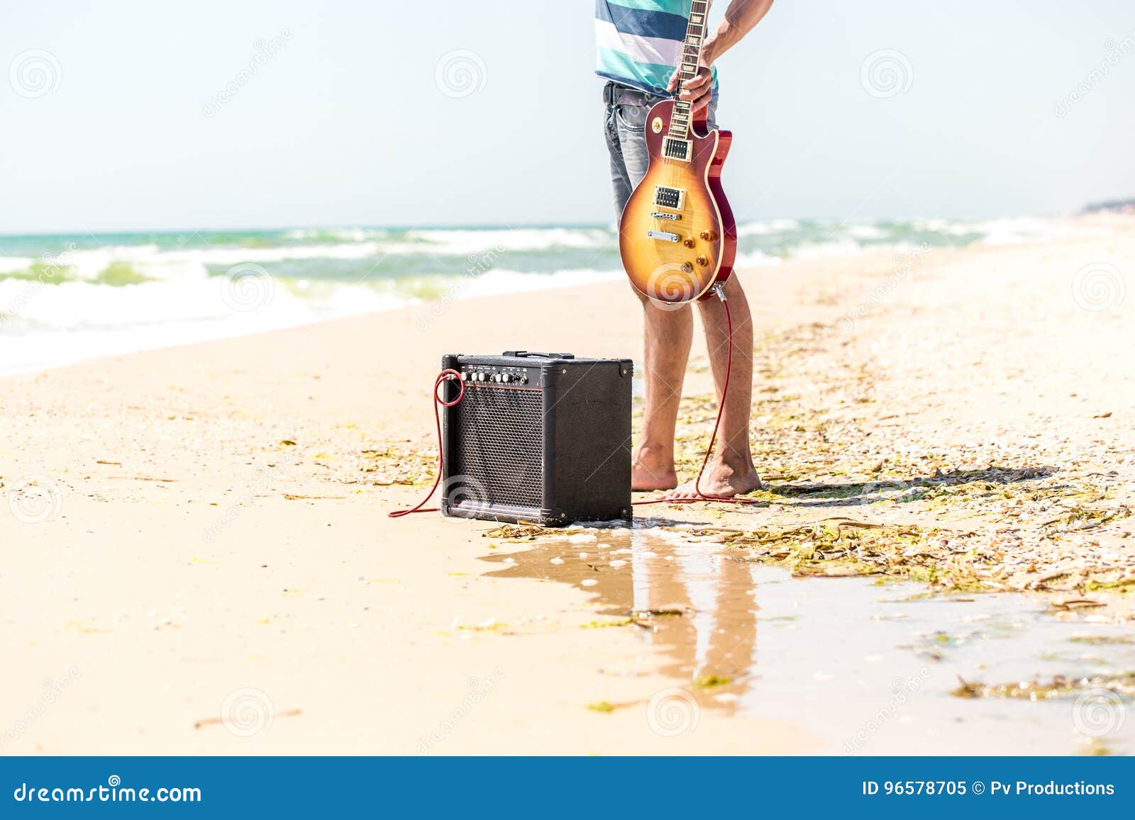 The Guy on the Beach with Musical Instruments Stock Image - Image of ...