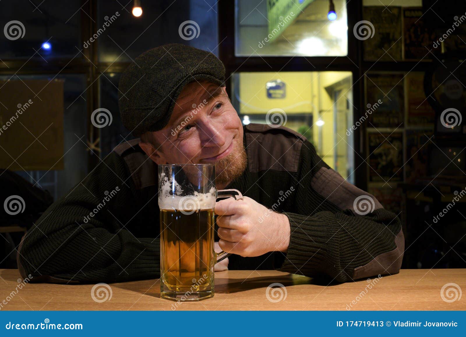 Guy with beer in the bar stock image. Image of draught - 174719413