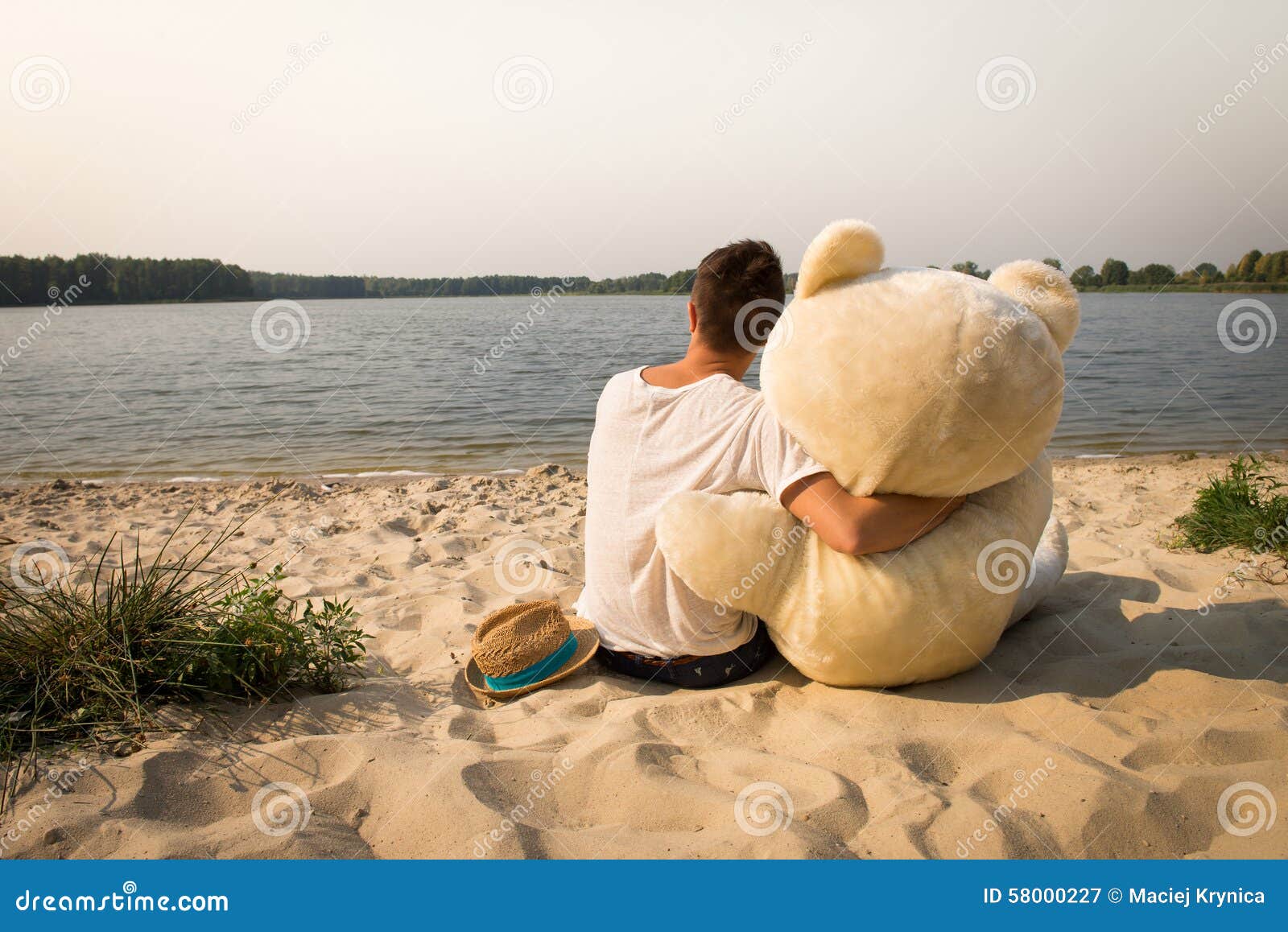 Guy with a big teddy bear stock image. Image of lovely - 58000227