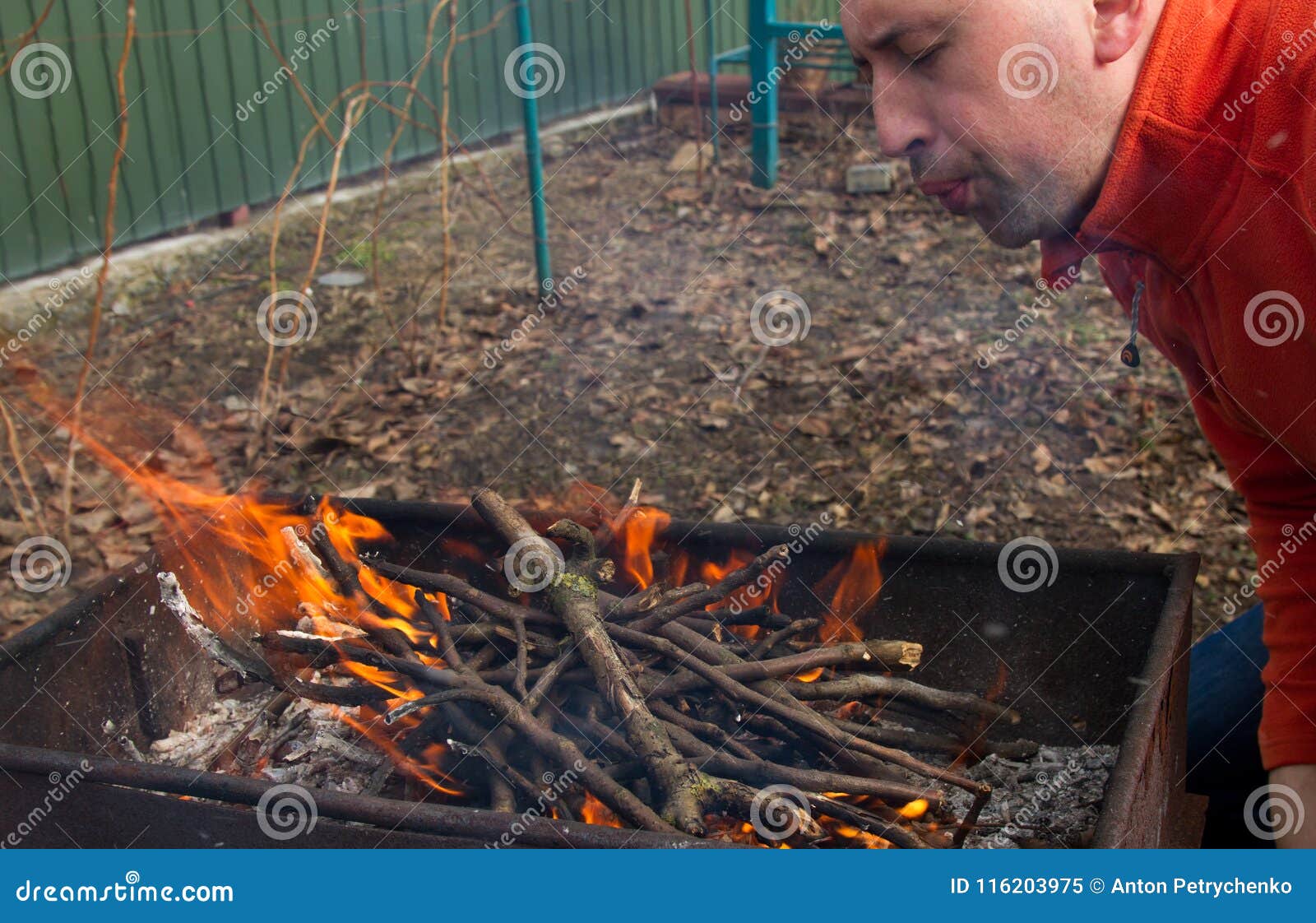 The guy blowing the fire stock image. Image of lifestyle - 116203975
