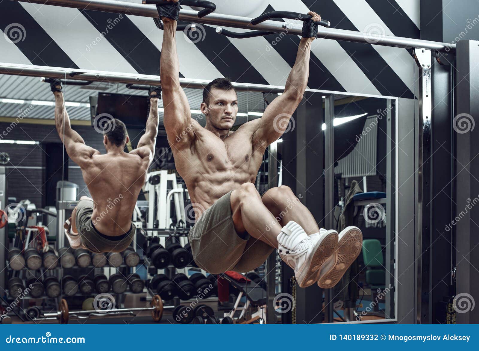 Guy Bodybuilder Do Chin-ups Stock Photo - Image of powerful, indoor ...